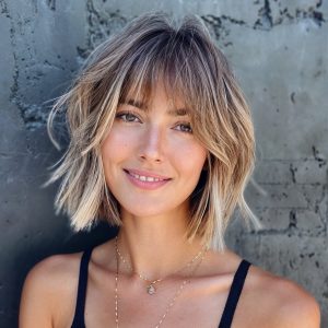 Embrace Your Inner Rockstar With These 35 Short Shags with Bangs